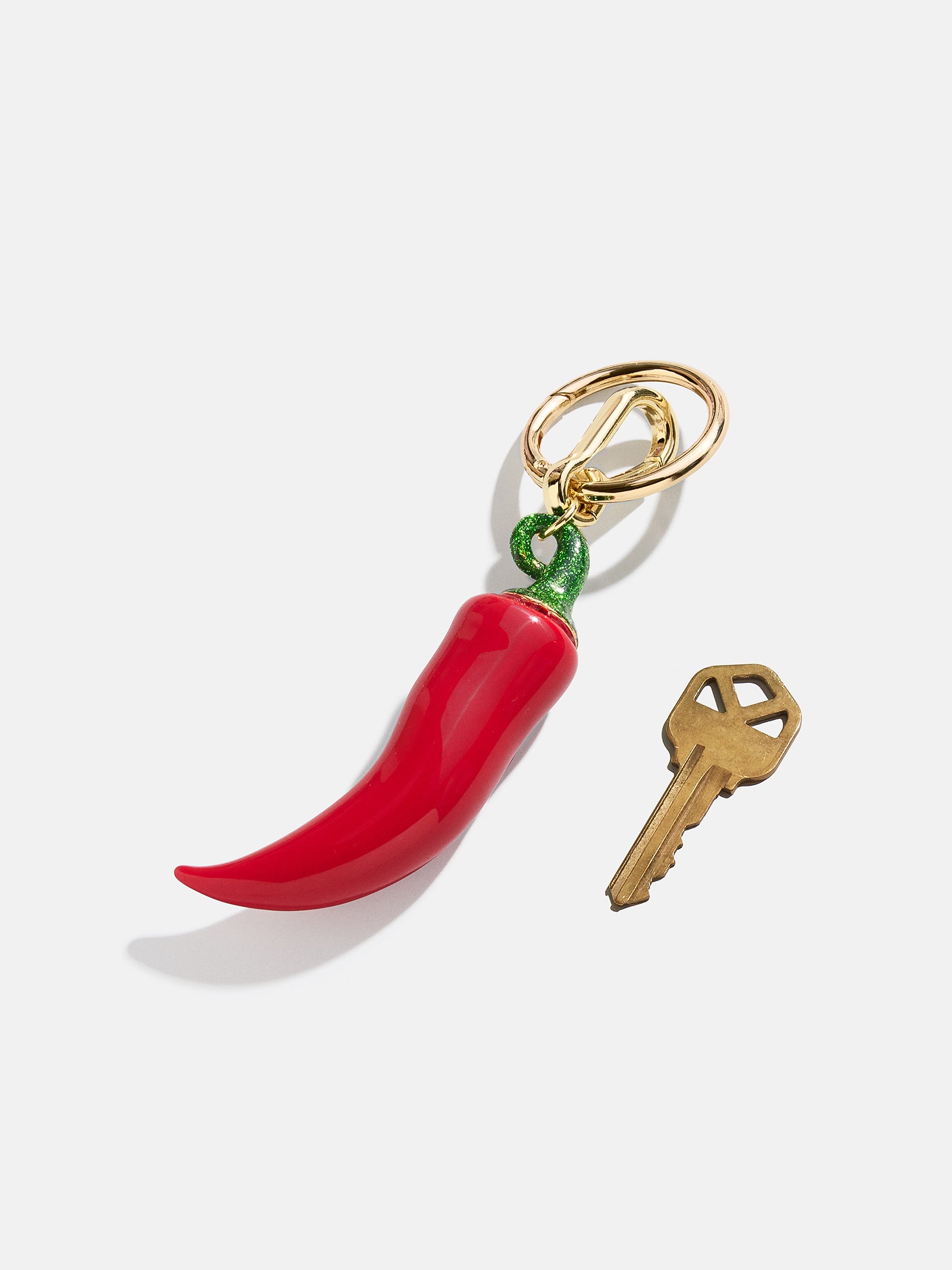 Bring The Heat Bag Charm - Pepper – Red chili pepper bag charm – BaubleBar