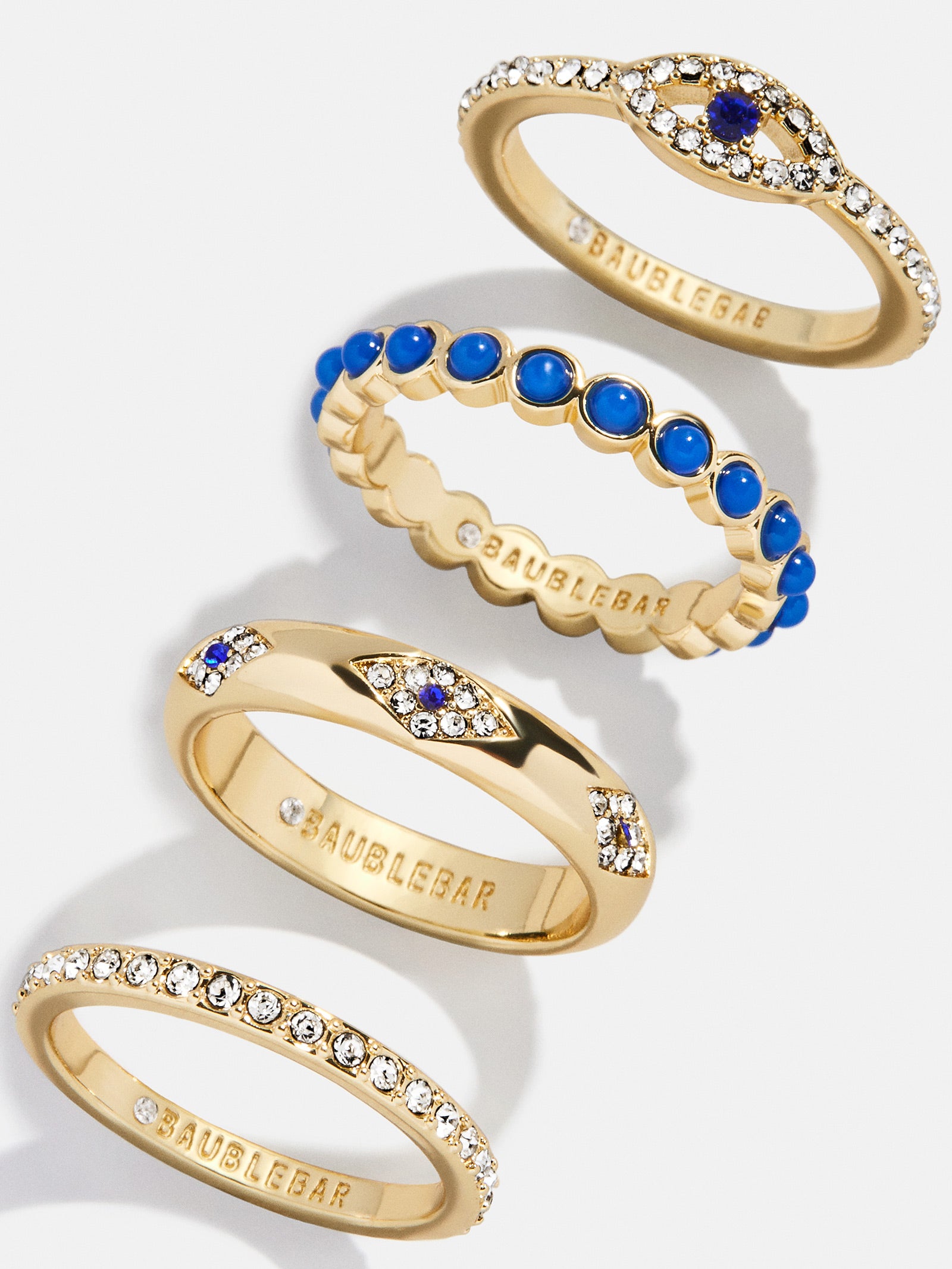 Evil Eye Ring Set - Gold/Blue – Set of four gold rings – BaubleBar