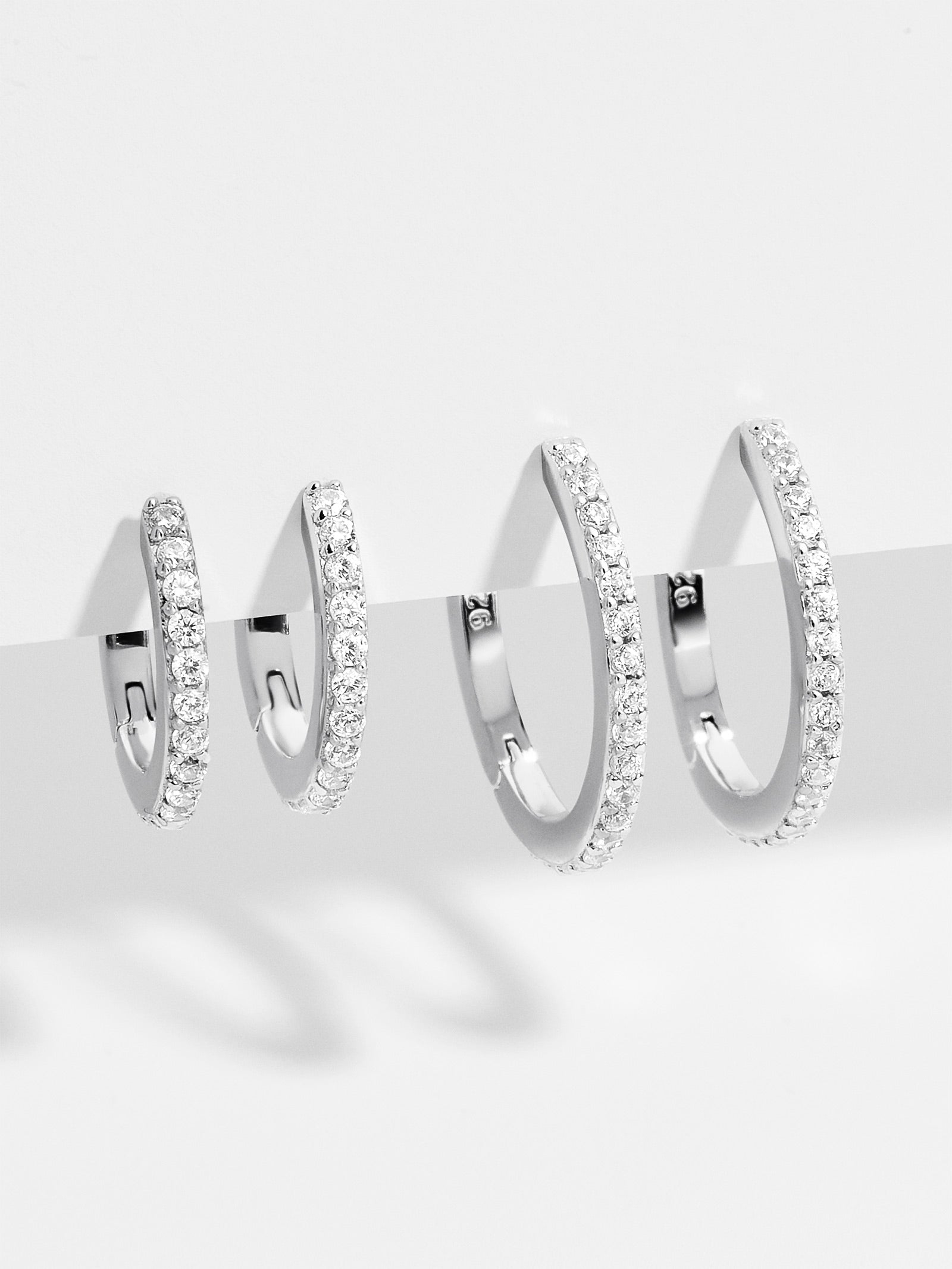 Niata Huggie Hoops - 14mm – Cubic Zirconia huggie hoops – BaubleBar